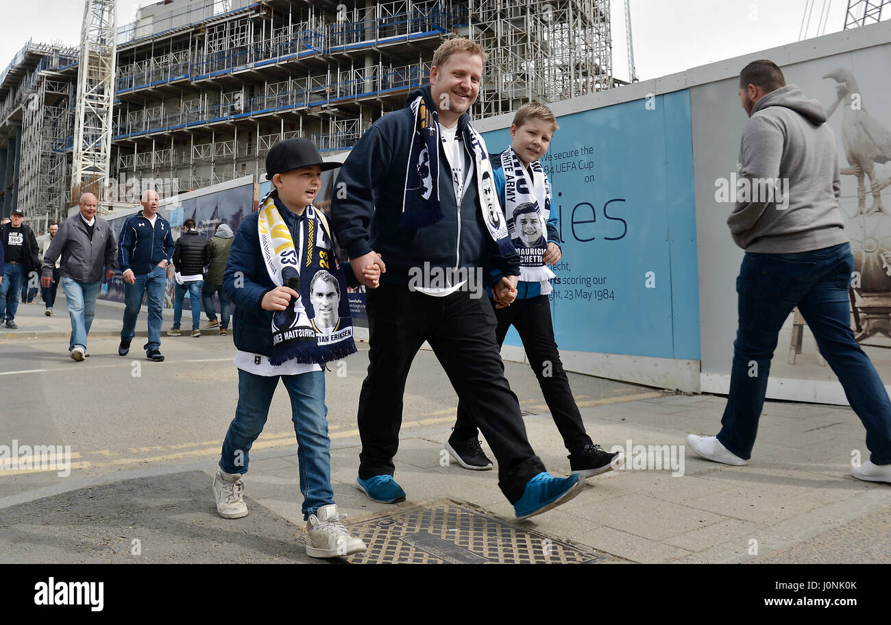 Tottenham Hotspur's fans make their way to the stadium prior to the ...