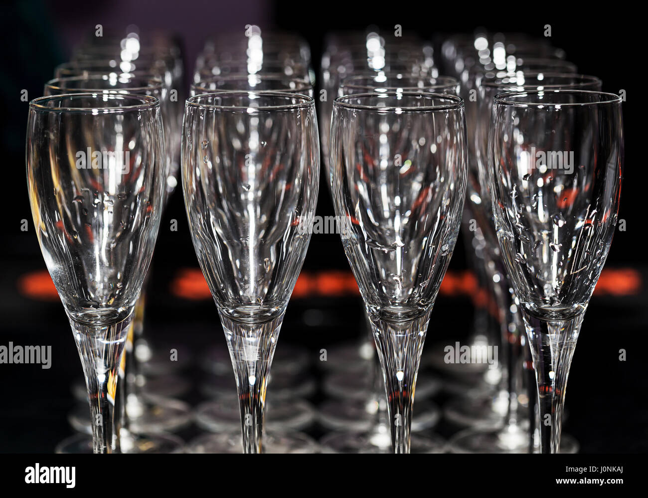 row of empty champagne glasses for nice party Stock Photo - Alamy