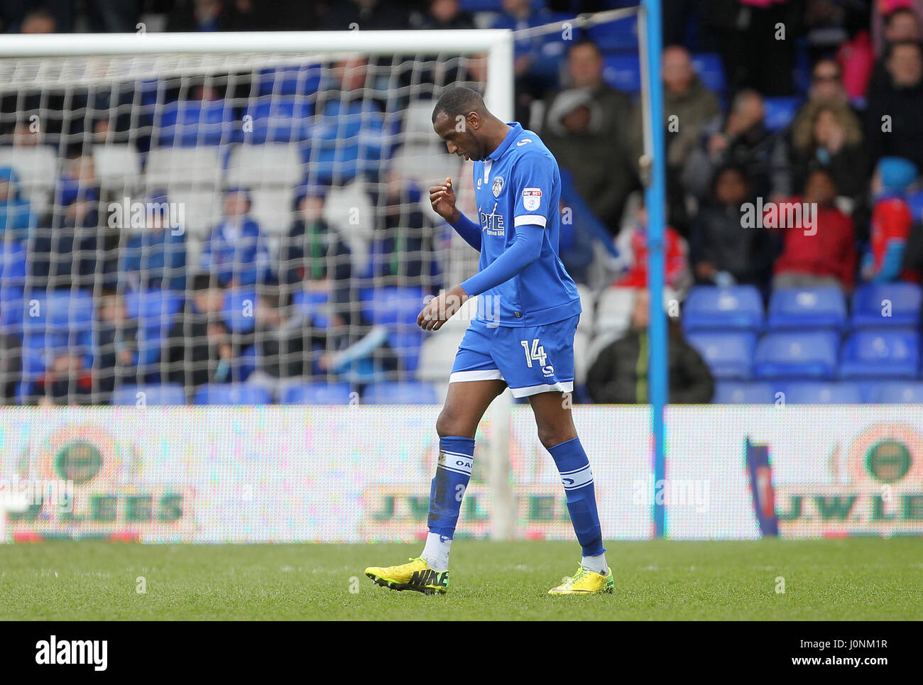 Oldham Athletic's Michael Ngoo leaves the field after being shown a red ...