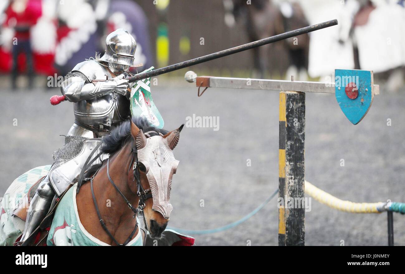 A man dressed as a knight takes part in a jousting competition during ...