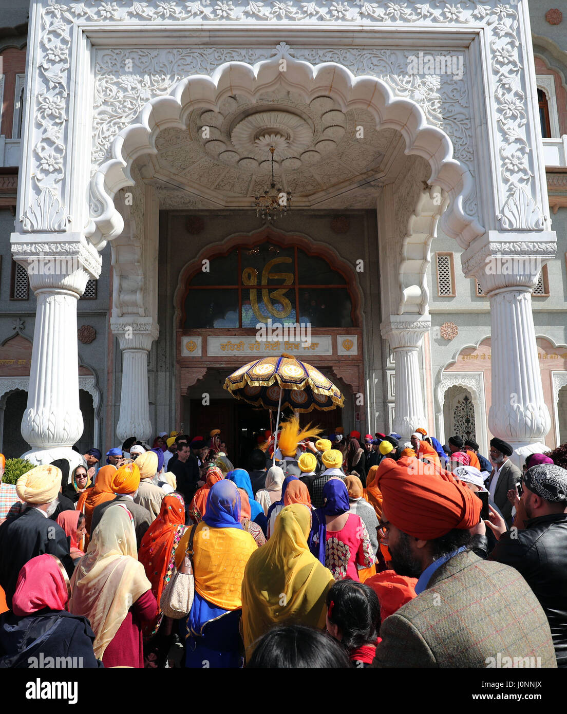 The Guru Granth Sahib, the Sikh holy book, is carried into the Guru ...