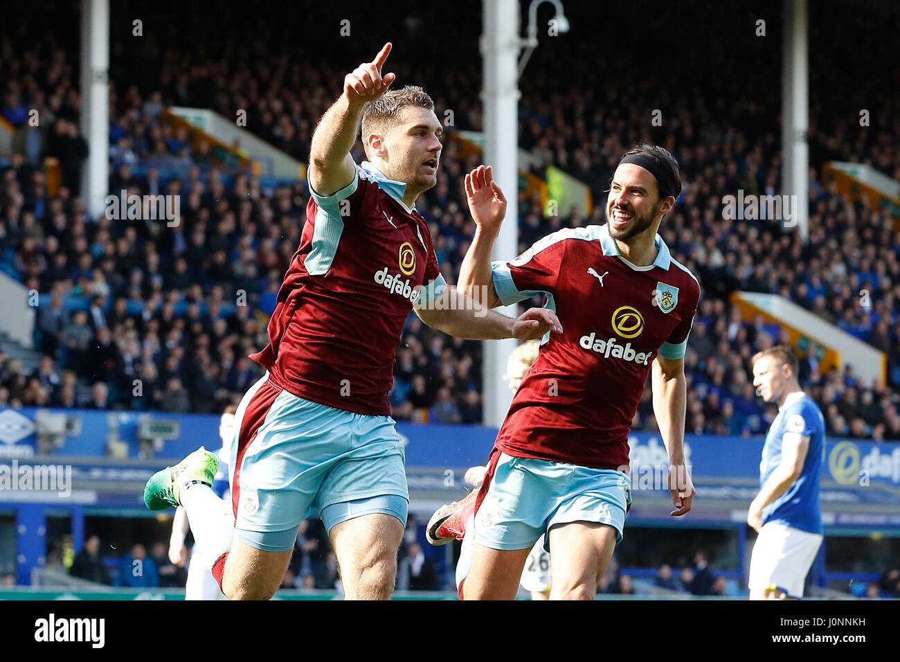 Burnley's Sam Vokes (left) celebrates scoring his side's first goal of ...