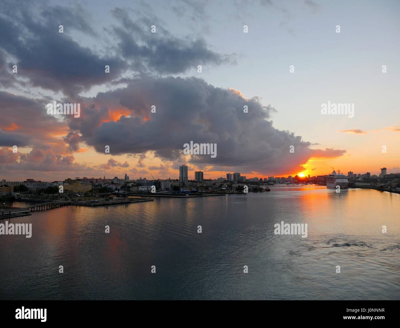 Sunset clouds above Puerto Rico port Heavy clouds hover above the port ...