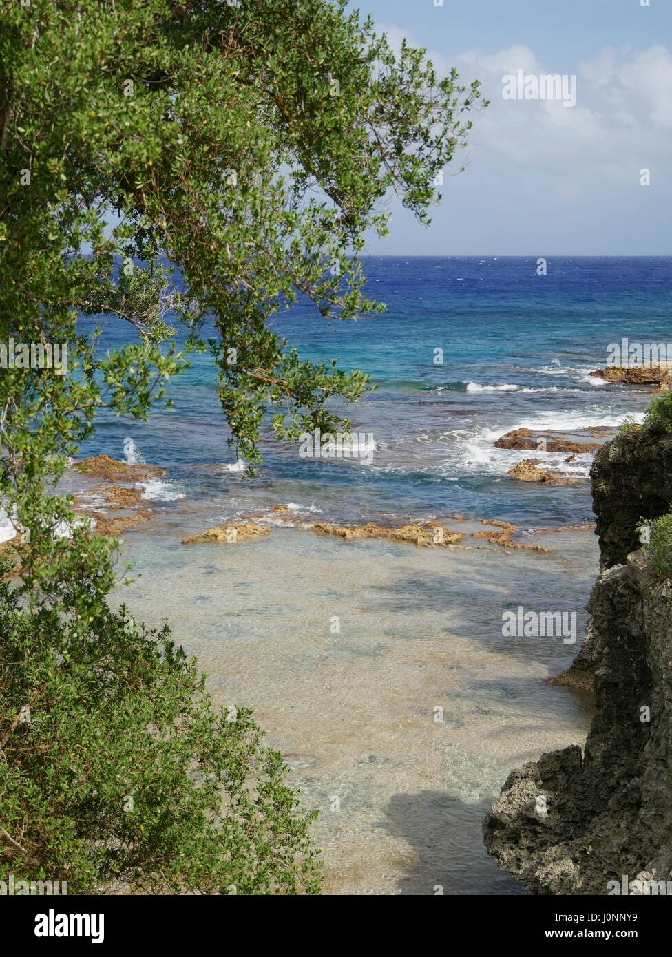 Romantic coves with pristine blue waters, Rota, Northern Mariana ...