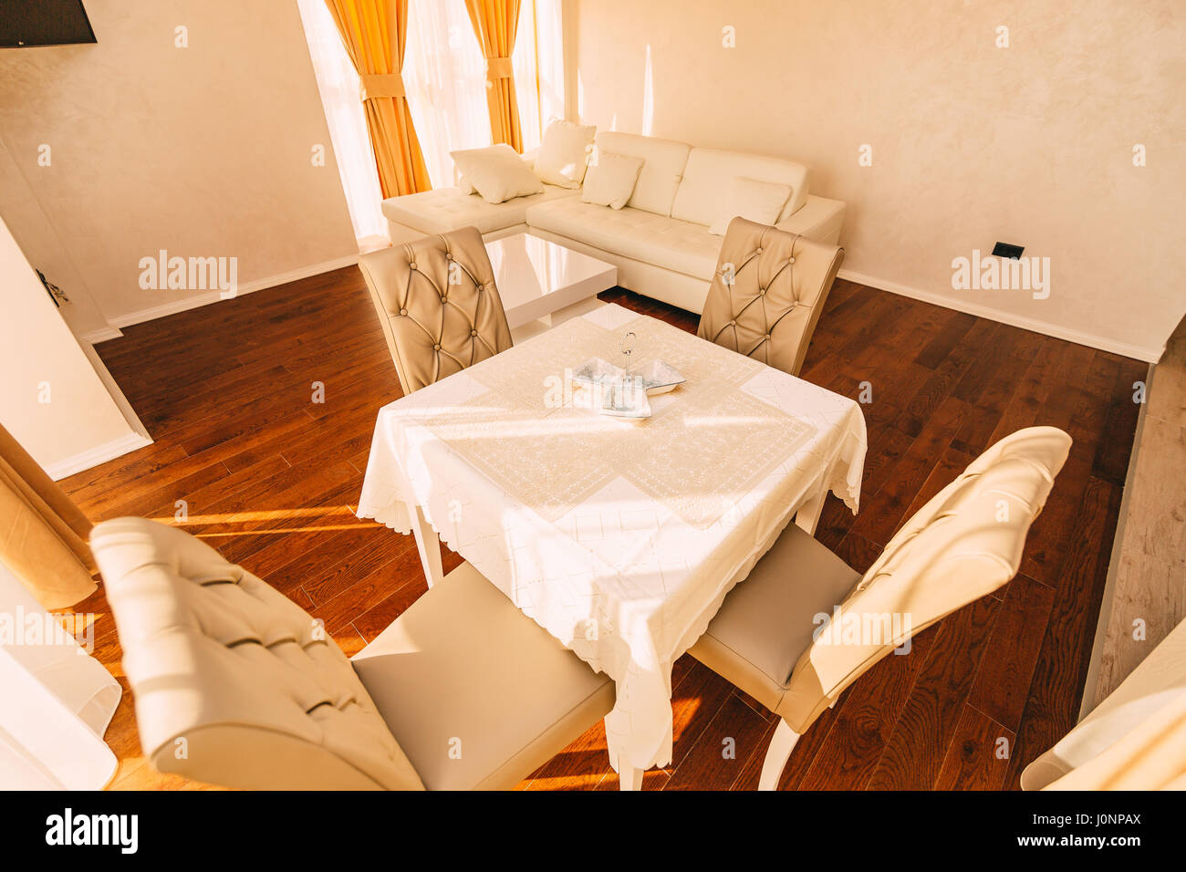 The dining table in the apartment. Table for lunch in the living room ...