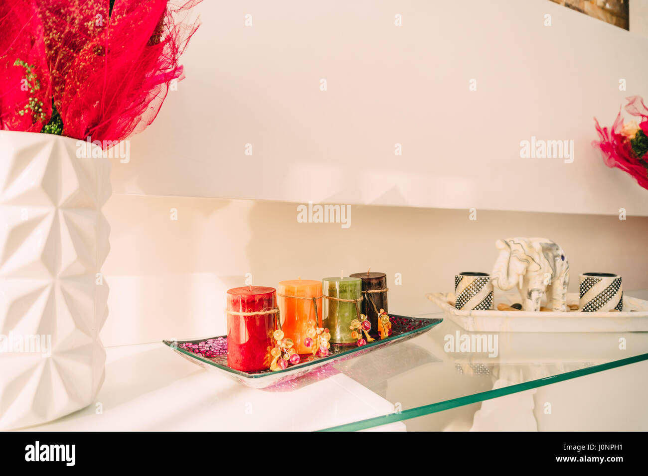 Elements of interior design. candles on the table Stock Photo - Alamy