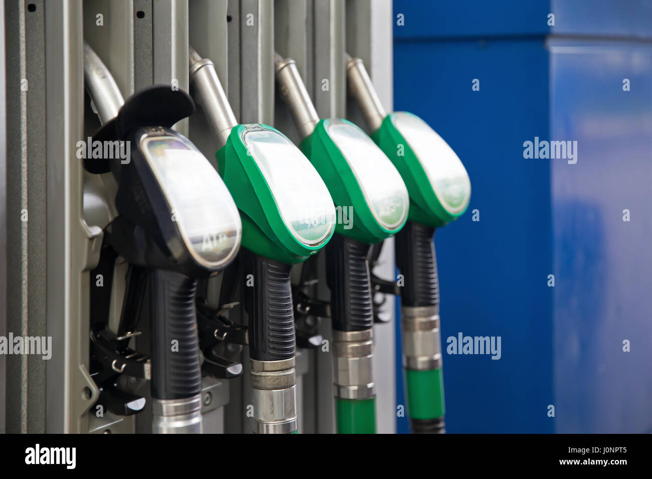 Blue gasoline fuel pump nozzle hi-res stock photography and images - Alamy