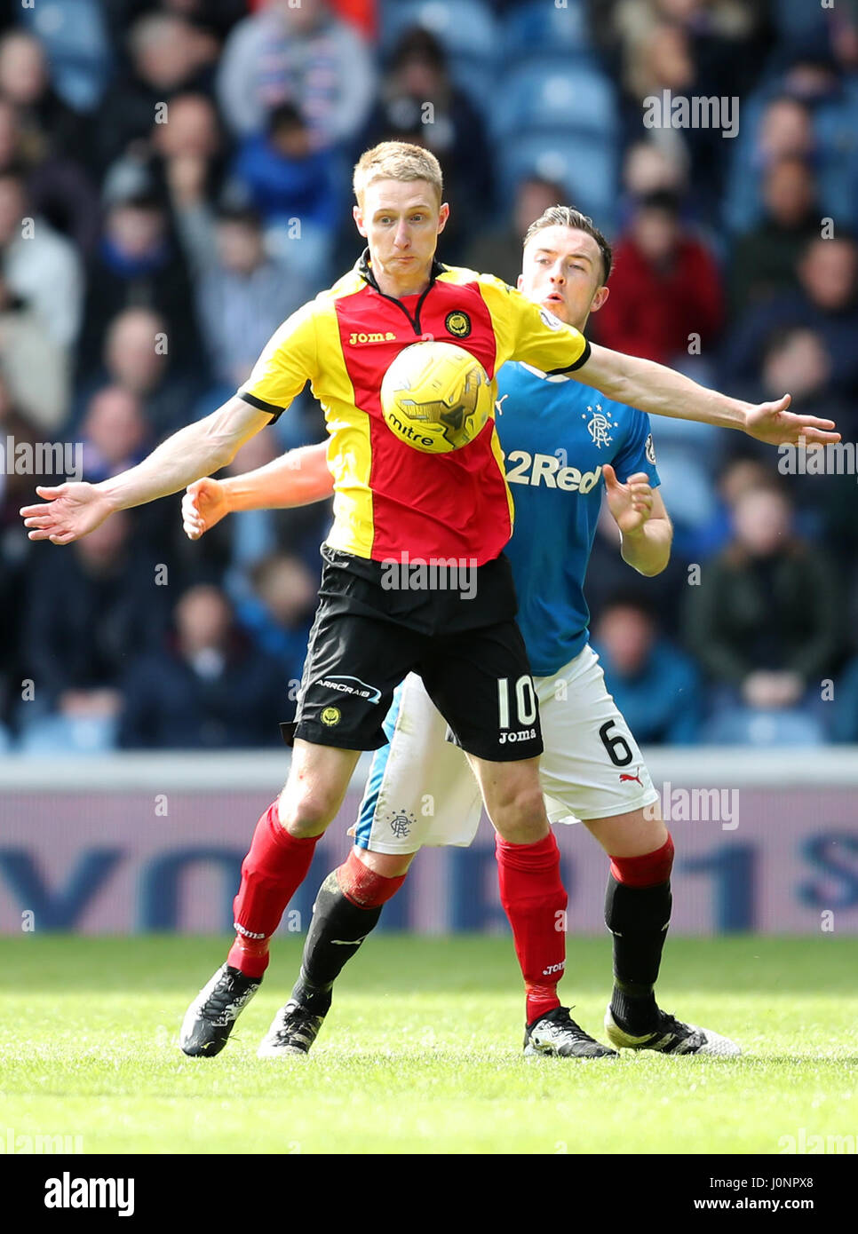 Rangers' Danny Wilson and Partick Thistle's Chris Erskine battle for ...