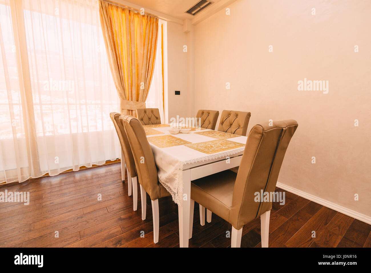 The dining table in the apartment. Table for lunch in the living room ...
