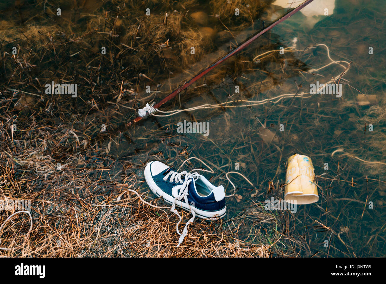 Plastic pollution ocean sneakers hi-res stock photography and images ...
