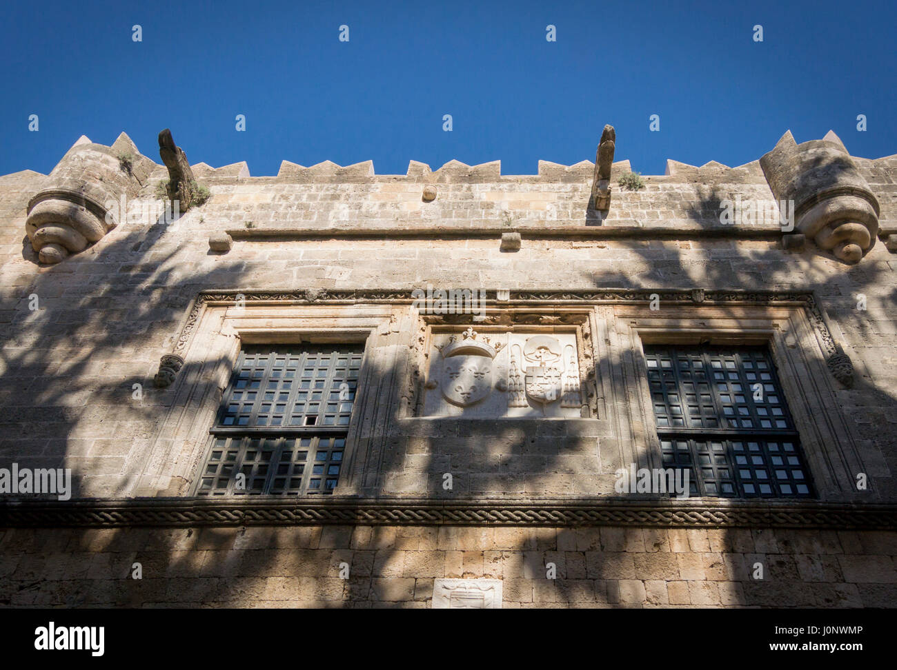 Detail of the upper part of a building in the old town of Rhodes ...