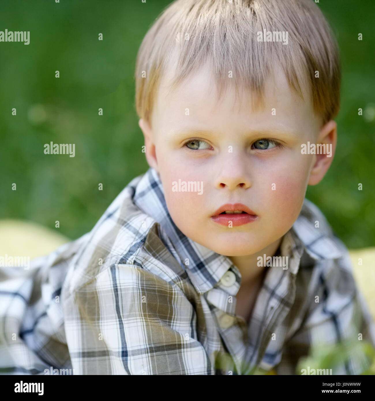 of young serious boy Stock Photo - Alamy