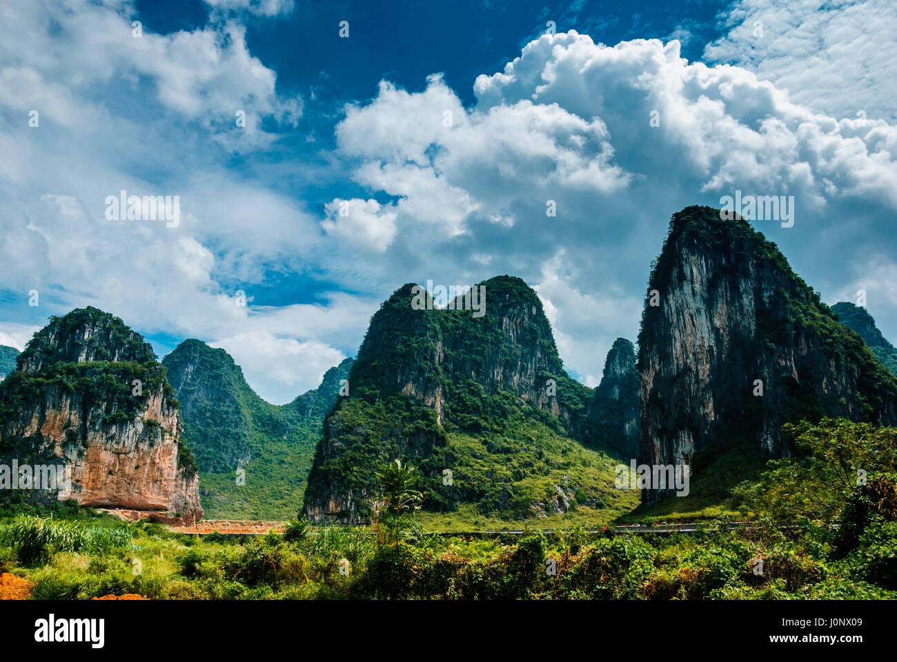 Beautiful karst mountains and rural scenery Stock Photo - Alamy