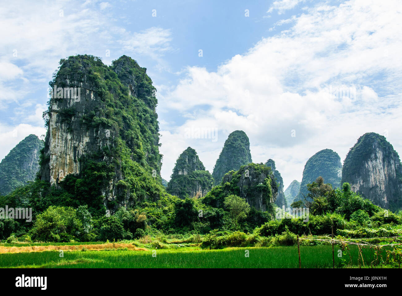 Beautiful karst mountains and rural scenery Stock Photo - Alamy
