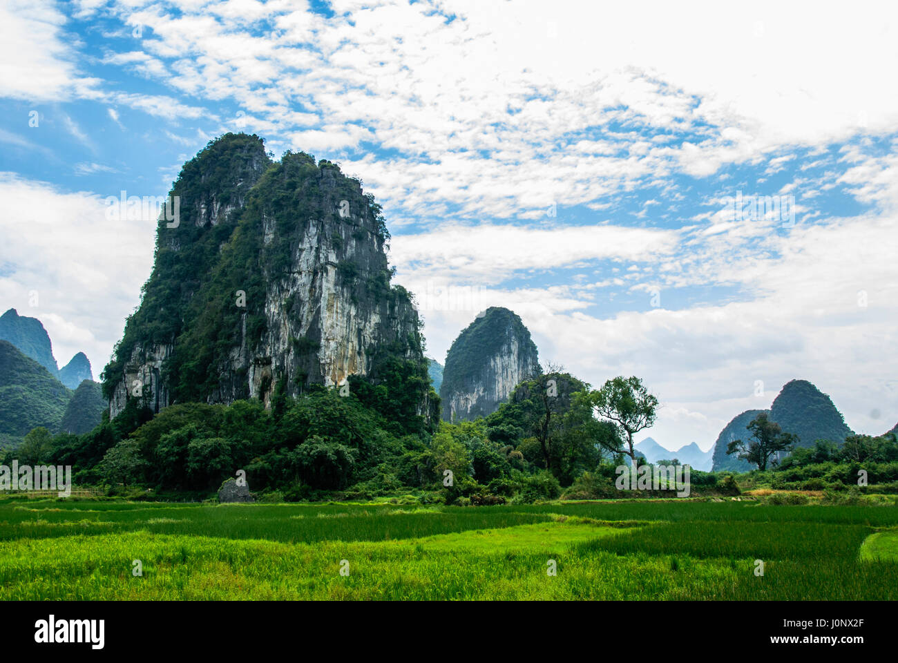 Beautiful karst mountains and rural scenery Stock Photo - Alamy