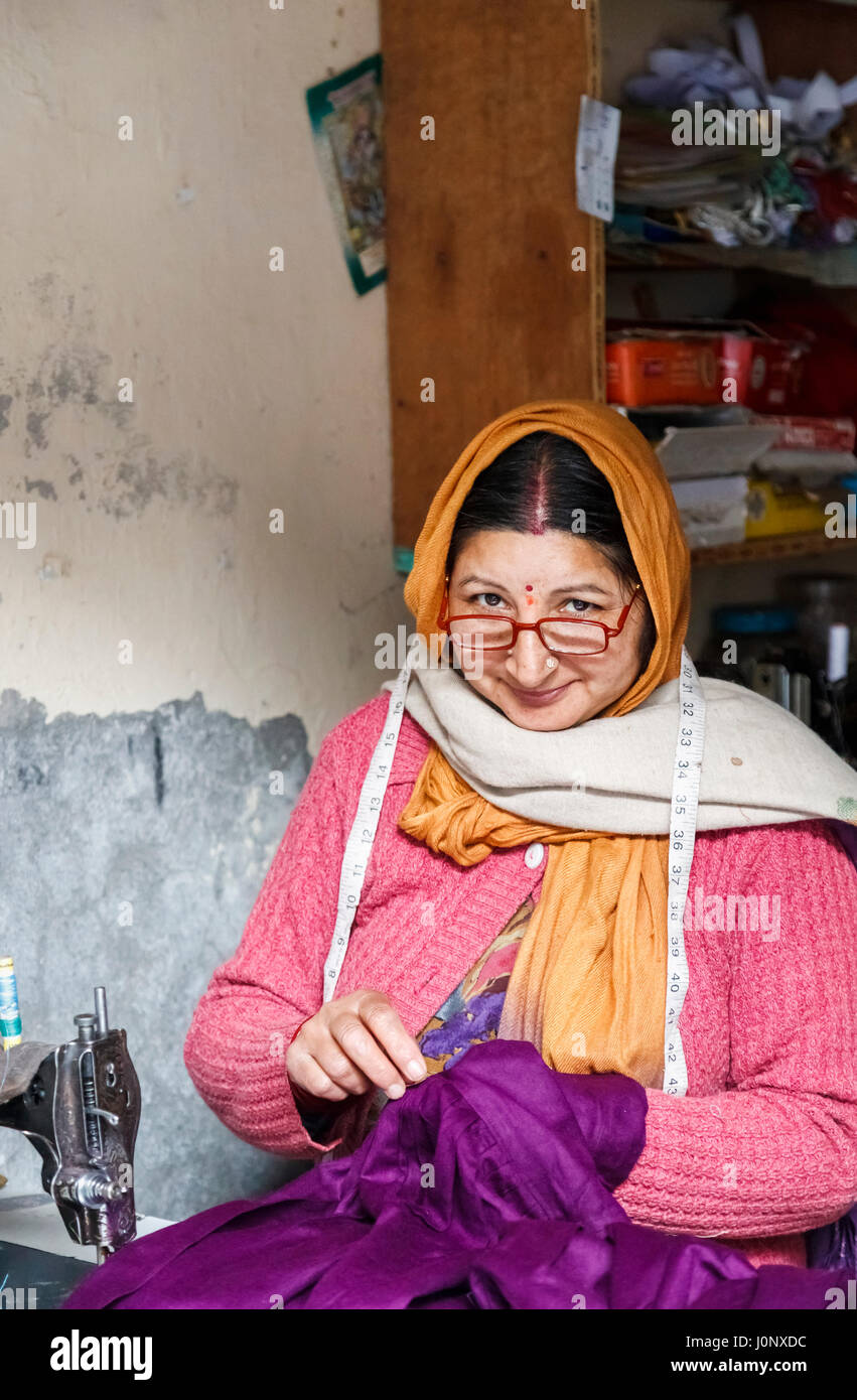 Indian woman sewing hi-res stock photography and images - Alamy