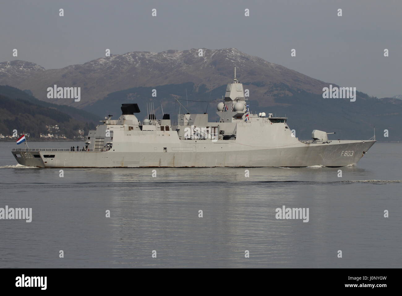 HNLMS Tromp (F803), a De Zeven Provincien-class frigate of the Royal Netherlands Navy, passing ...