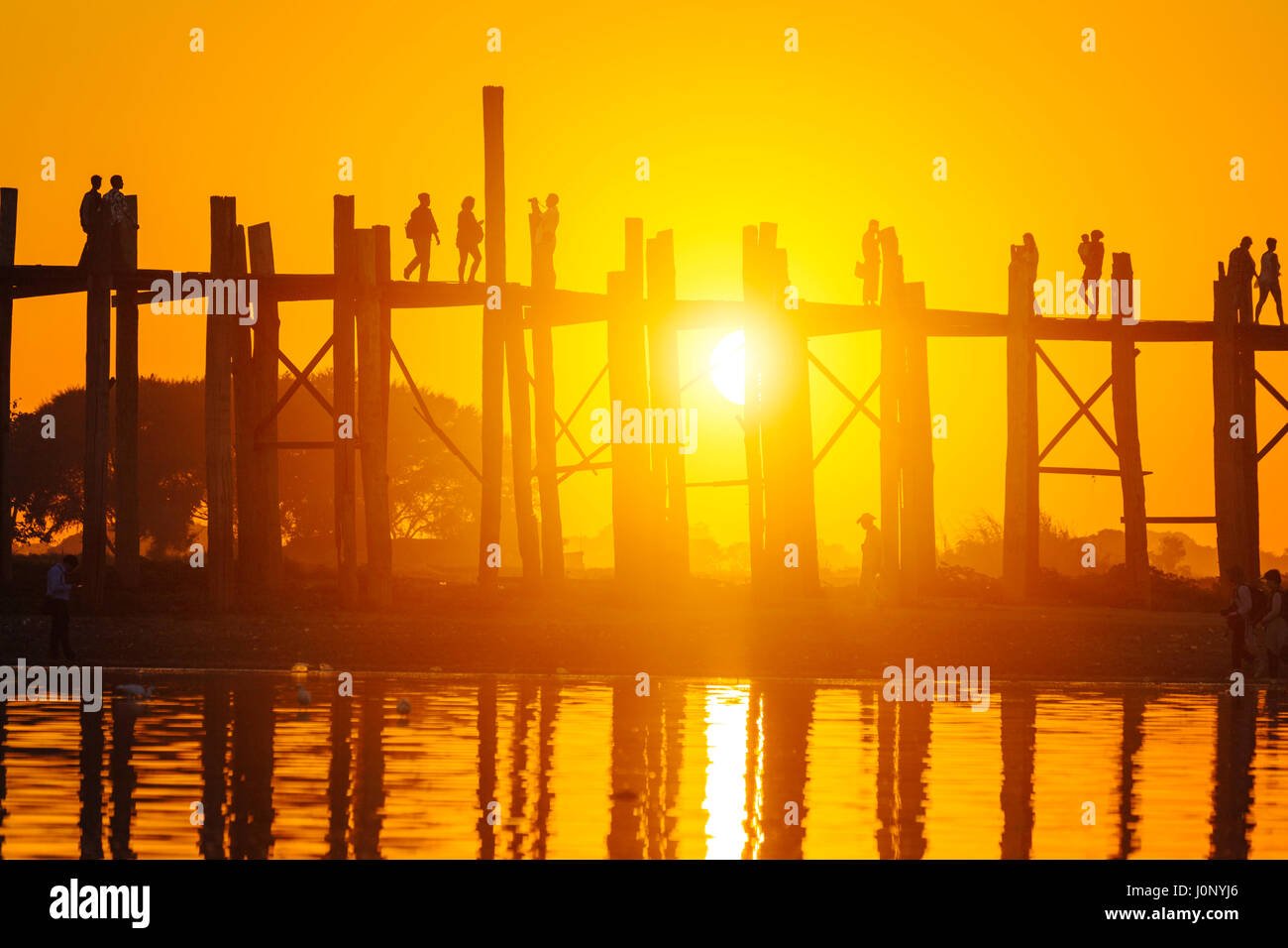 Bridge footbridge myanmar monk crossing hi-res stock photography and ...