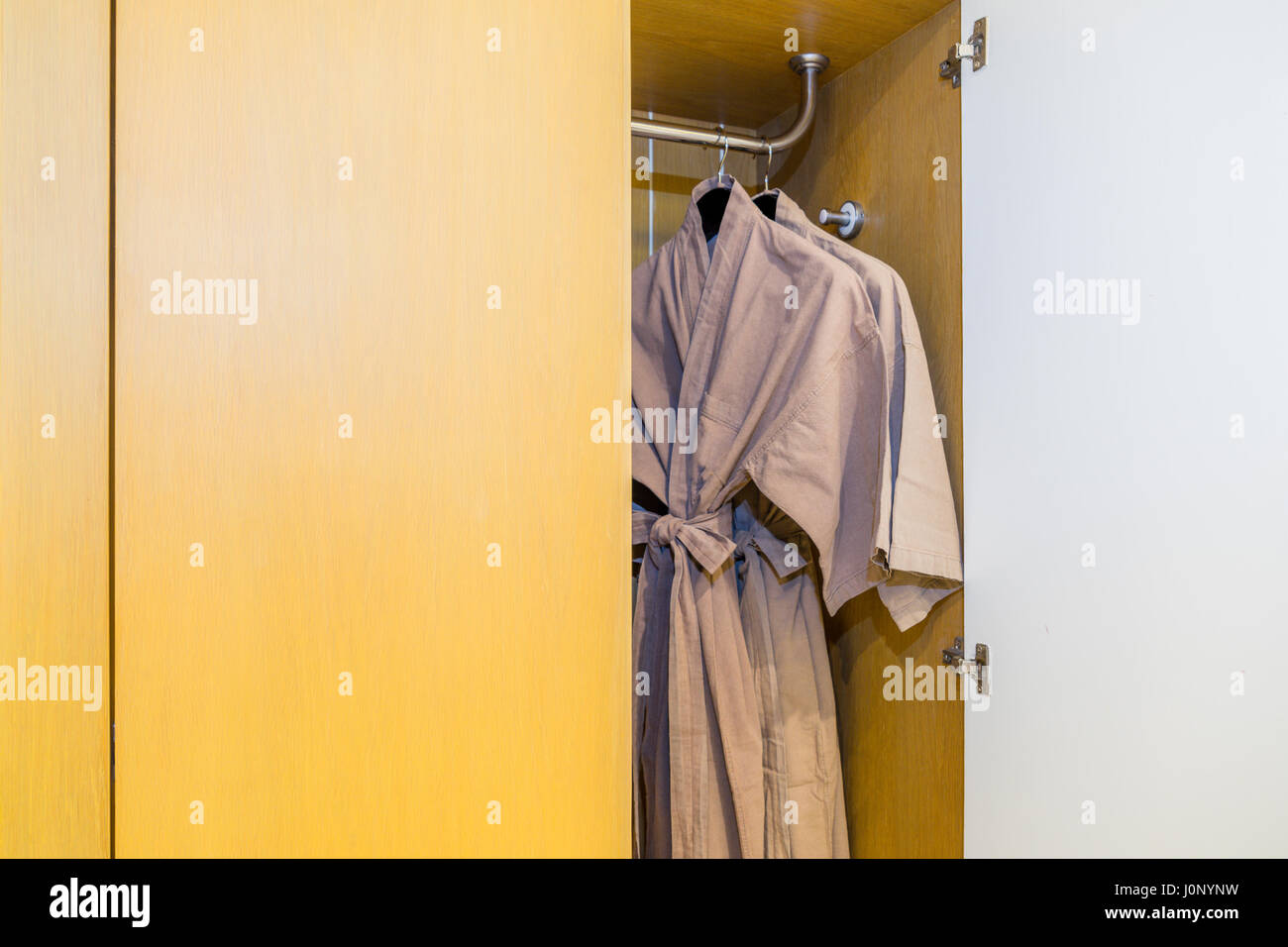 Hanging closet hi-res stock photography and images - Alamy
