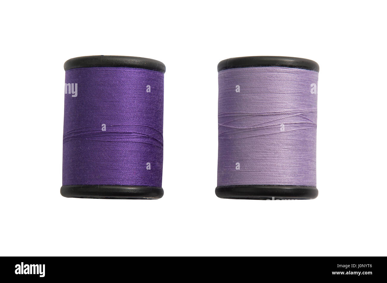 Thread bobbin isolated on white background Stock Photo - Alamy