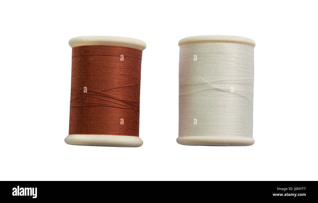 Thread bobbin isolated on white background Stock Photo - Alamy