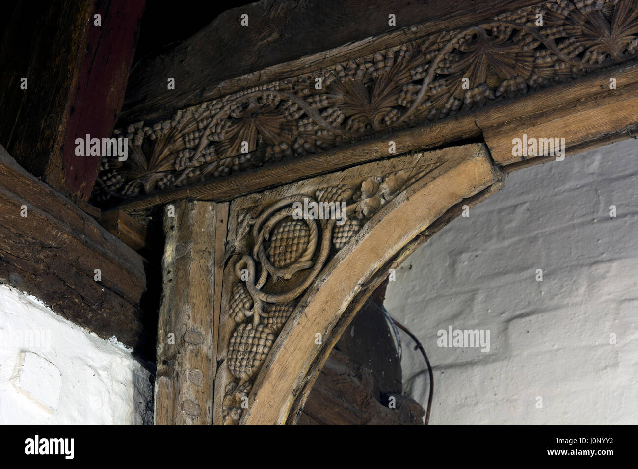 Old carved woodwork inside St Nicholas Church, Peopleton ...