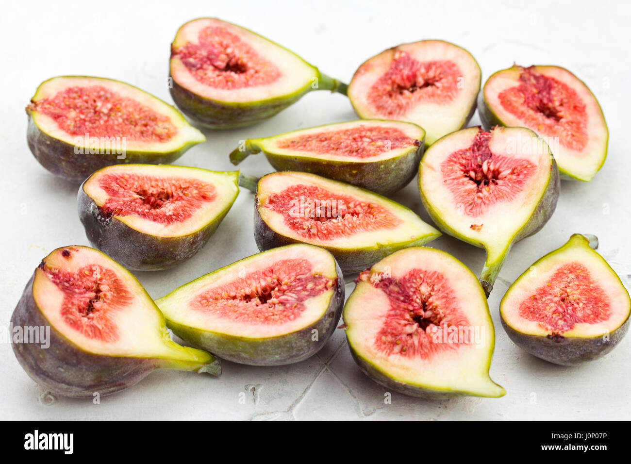 Fresh figs on white background Stock Photo - Alamy