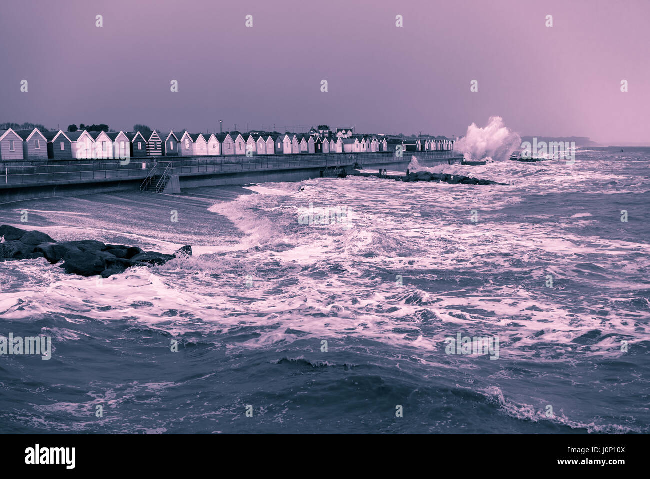 Southwold in Suffolk England with high tide and stormy weather beside ...