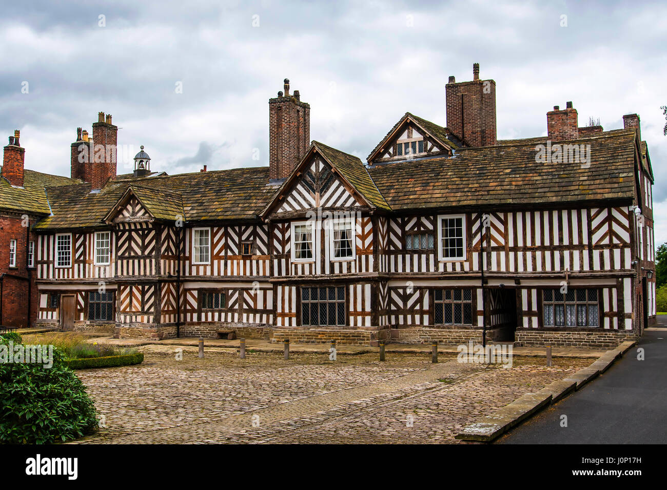 The Tudor Façade, extensive gardens and grounds of Adlington Hall in ...