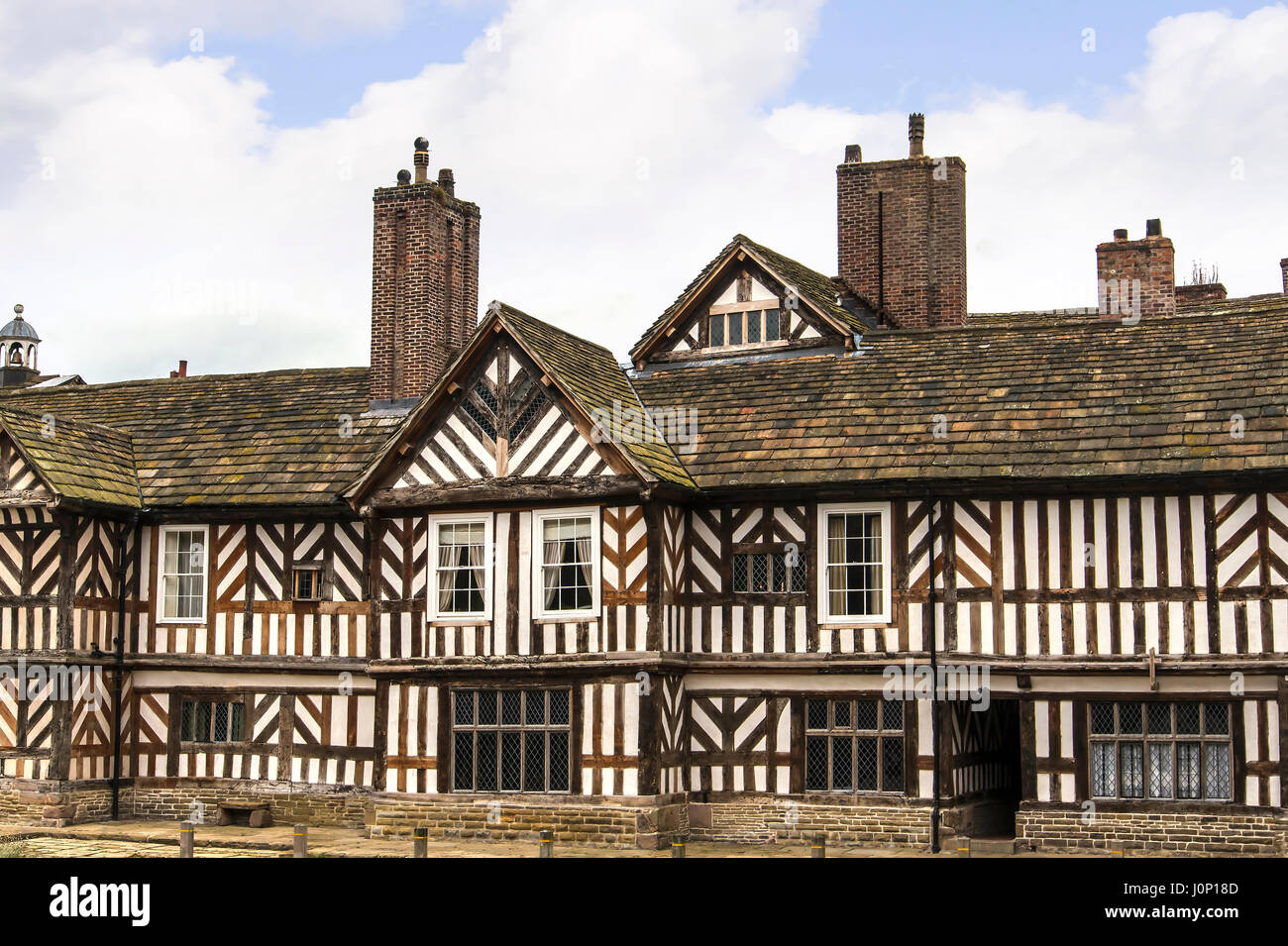 The Tudor Façade, extensive gardens and grounds of Adlington Hall in ...