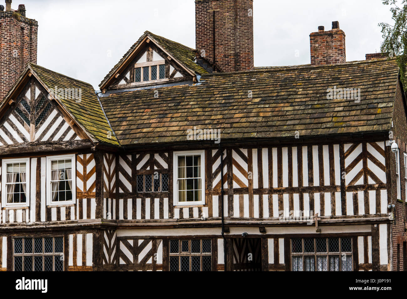 The Tudor Façade, extensive gardens and grounds of Adlington Hall in ...