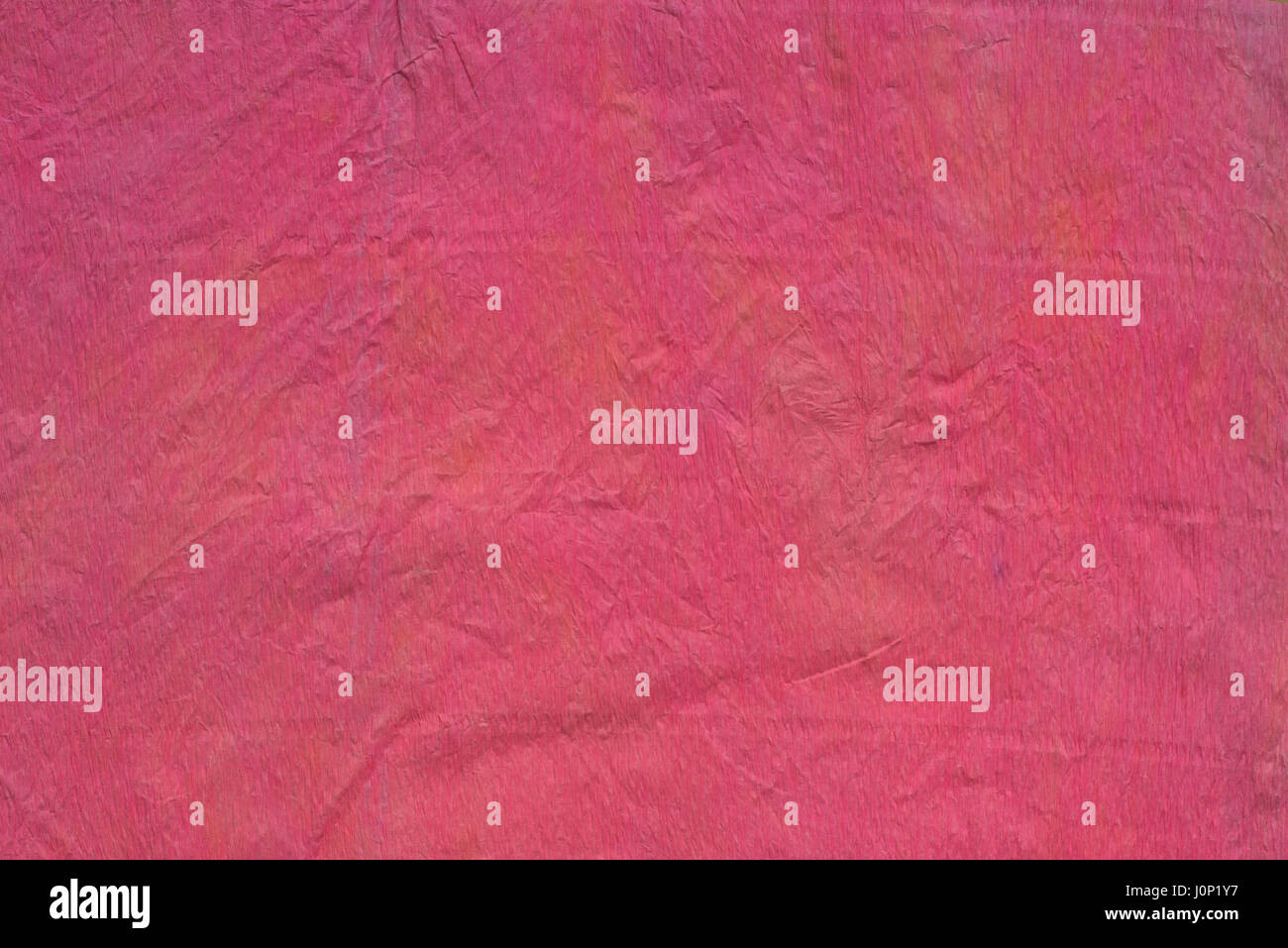 red crepe paper background texture Stock Photo - Alamy
