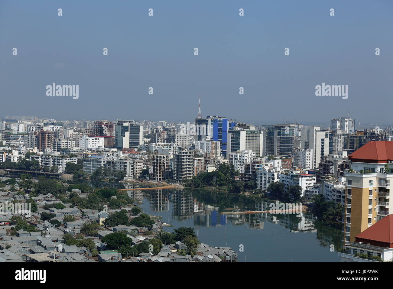 Korail Slum beside the high-rise buildings at Gulshan in Dhaka city ...