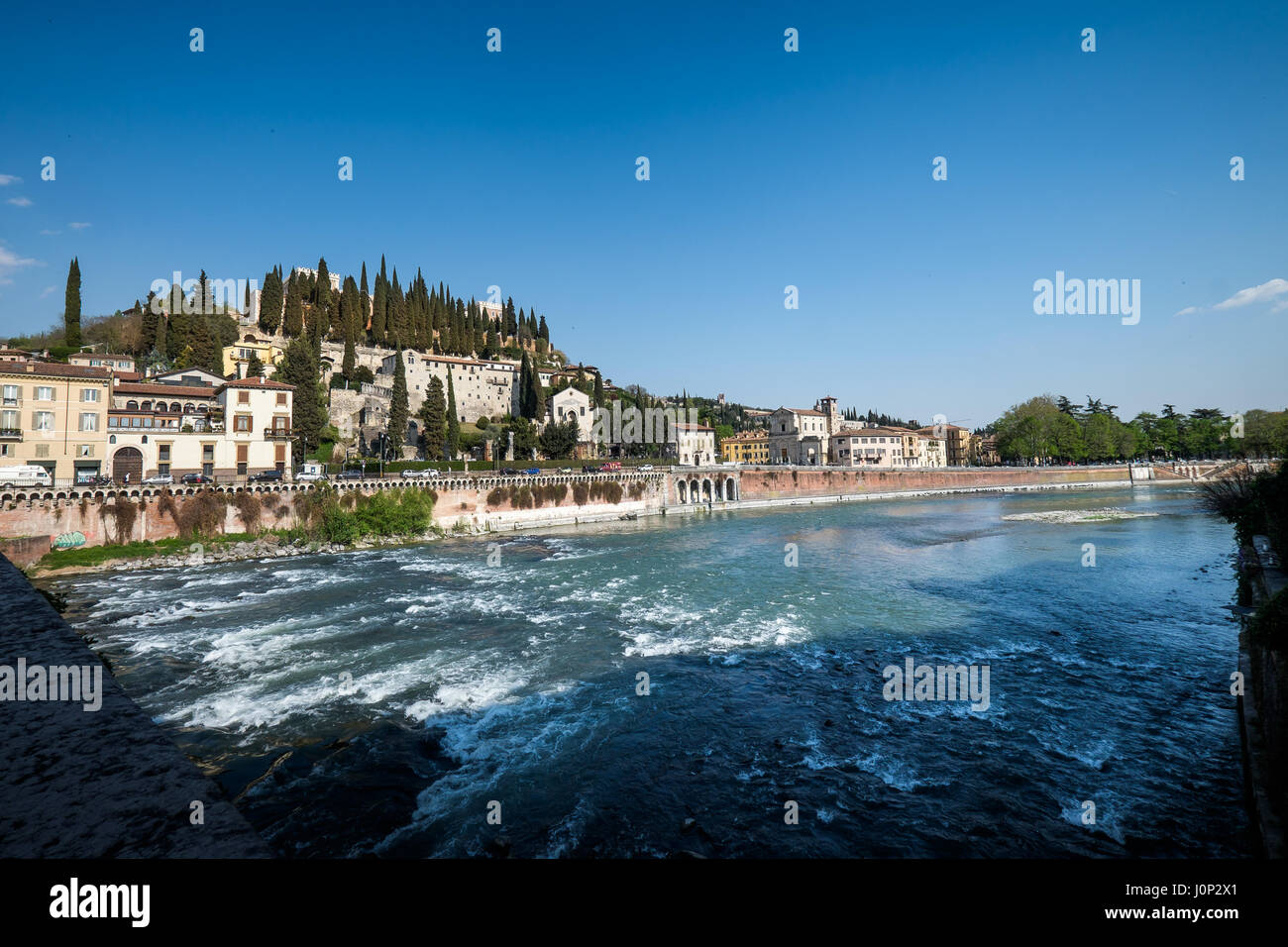 Verona, Italy - Ancient Roman bridge Ponte Pietra and the River Adige ...