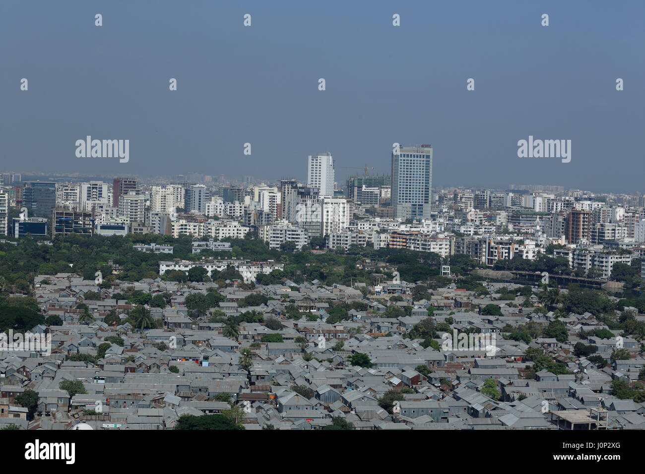 Korail Slum beside the high-rise buildings at Gulshan in Dhaka city ...