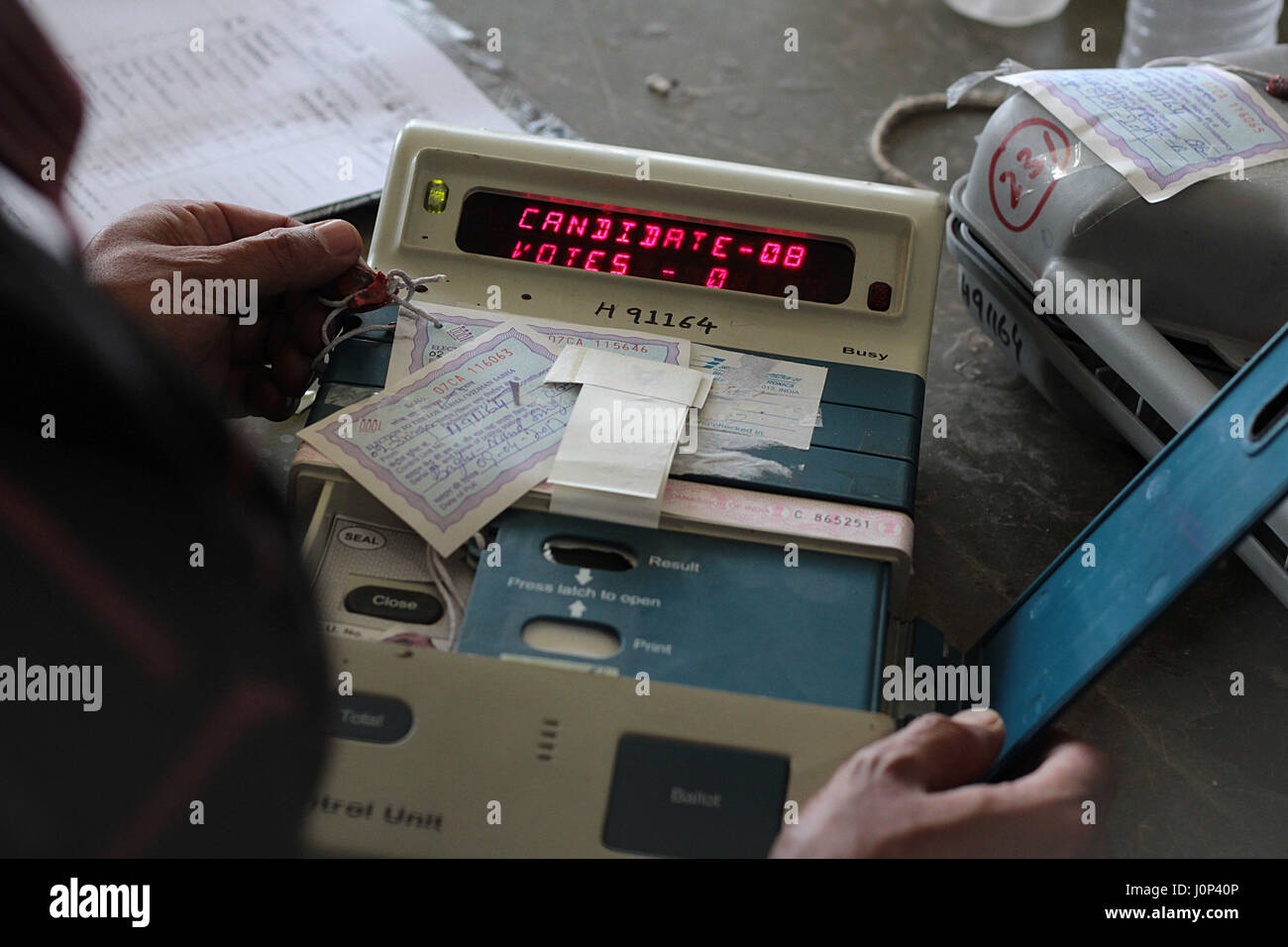 Srinagar, India. 15th Apr, 2017. Election officers inspect electronic ...