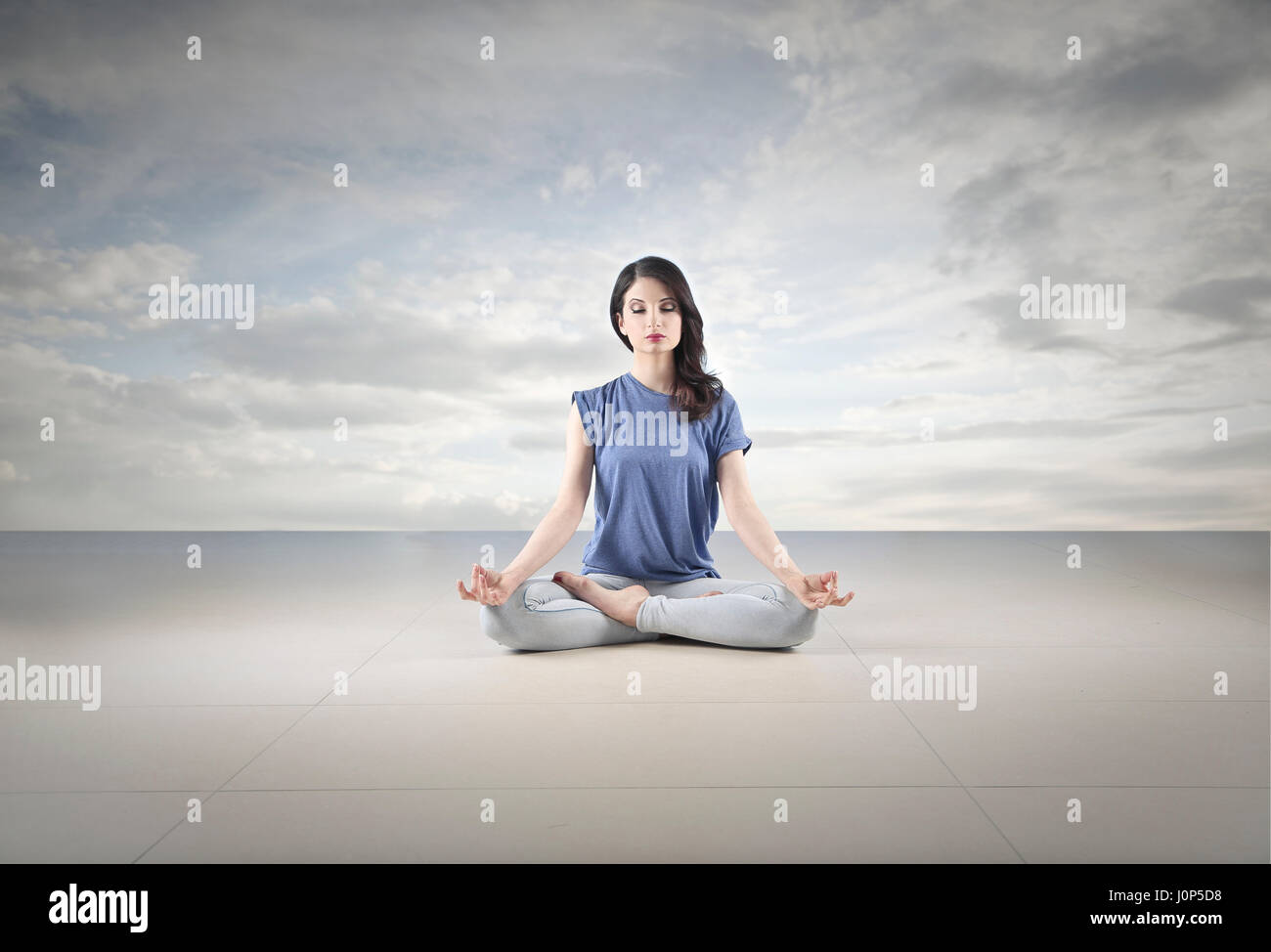 Woman mediating outside hi-res stock photography and images - Alamy