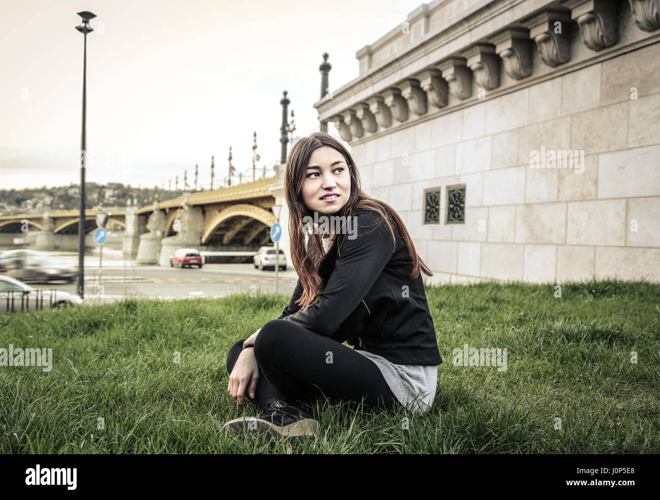 Girl sitting next river hi-res stock photography and images - Alamy