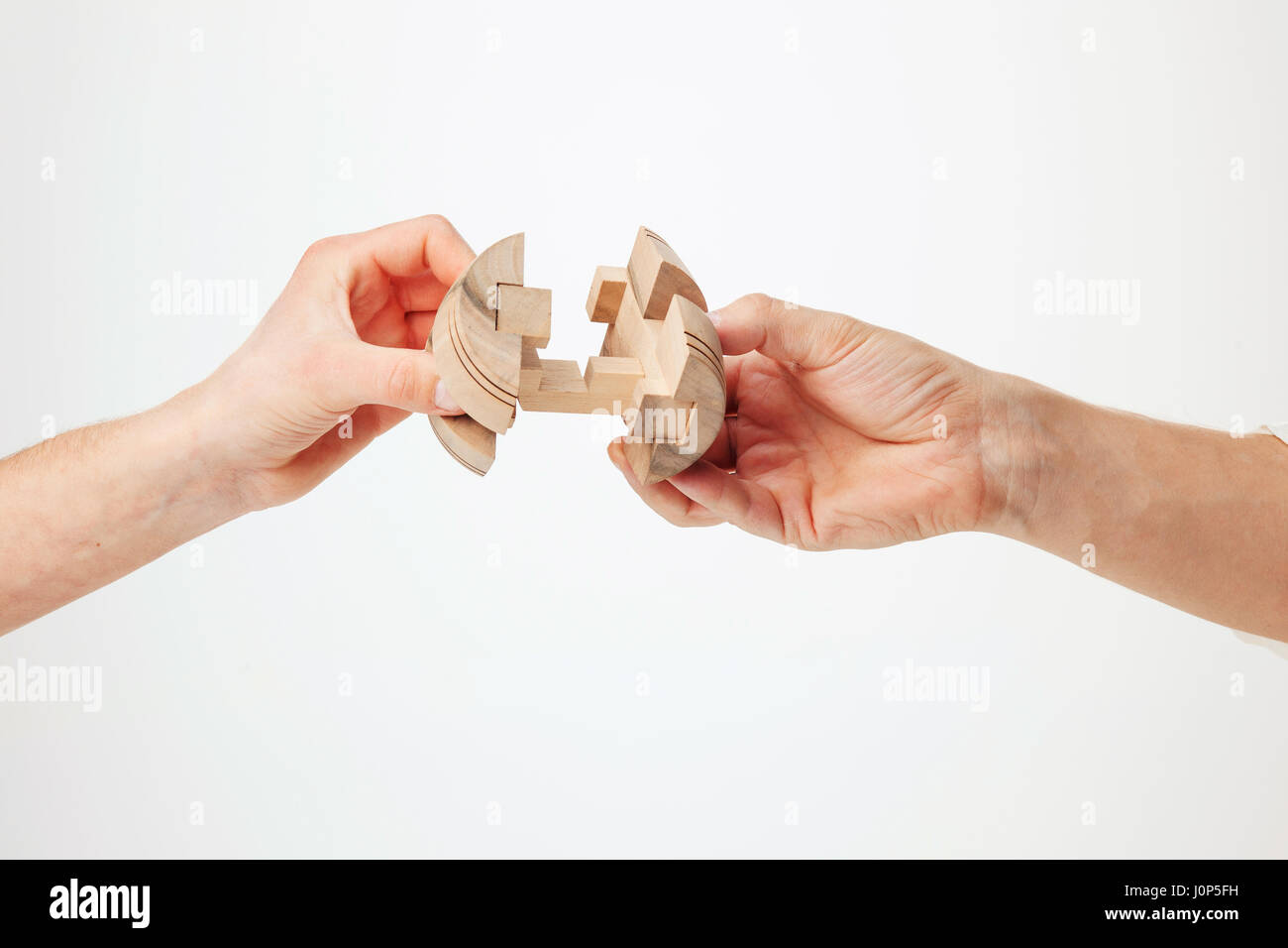 puzzle in hand isolated on white background Stock Photo - Alamy