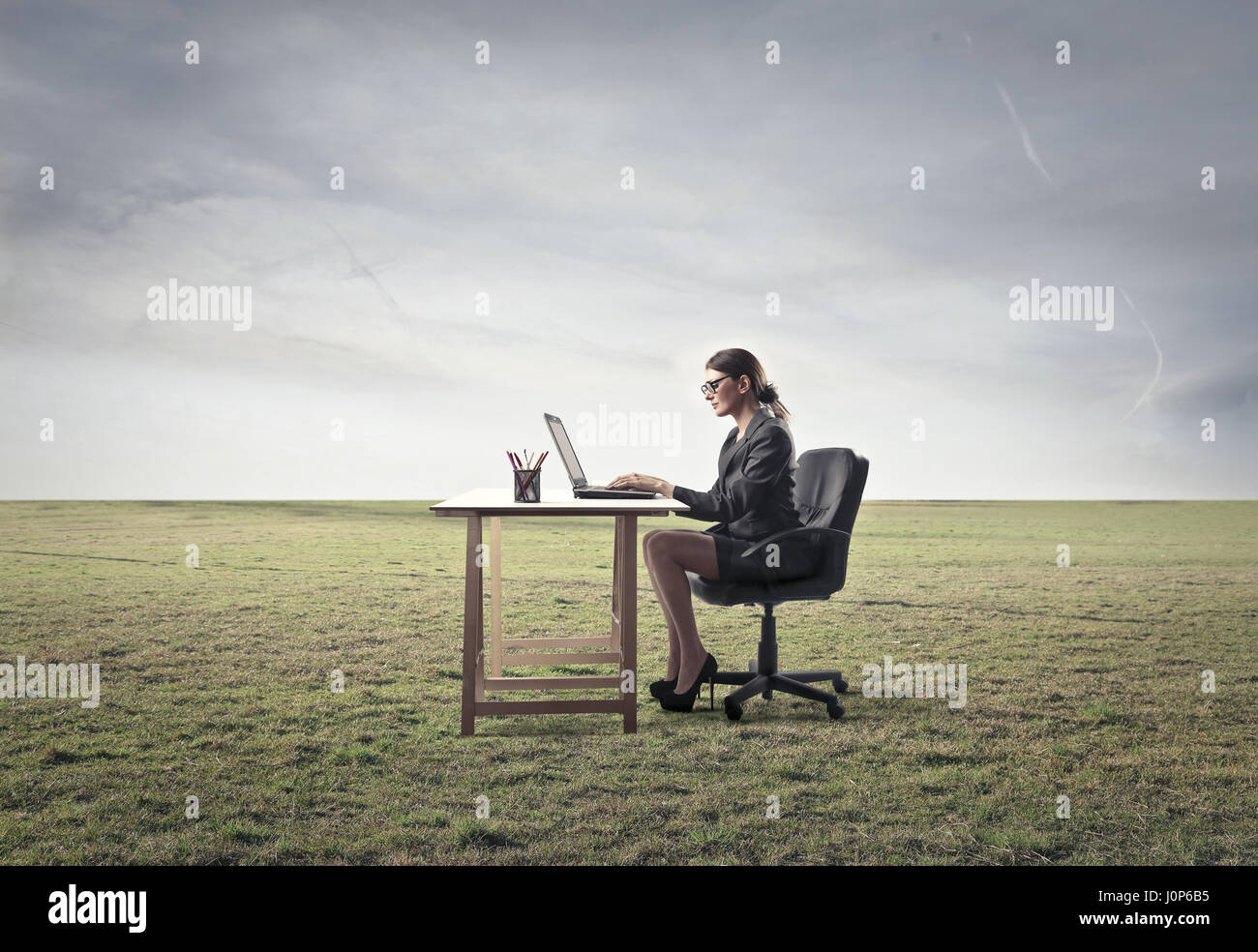 Businesswoman working outside Stock Photo - Alamy