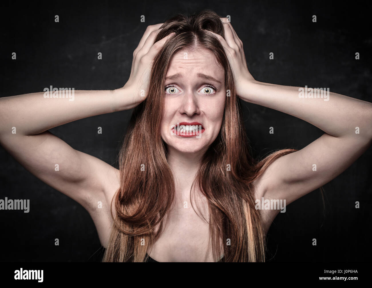 Young woman being worried Stock Photo - Alamy