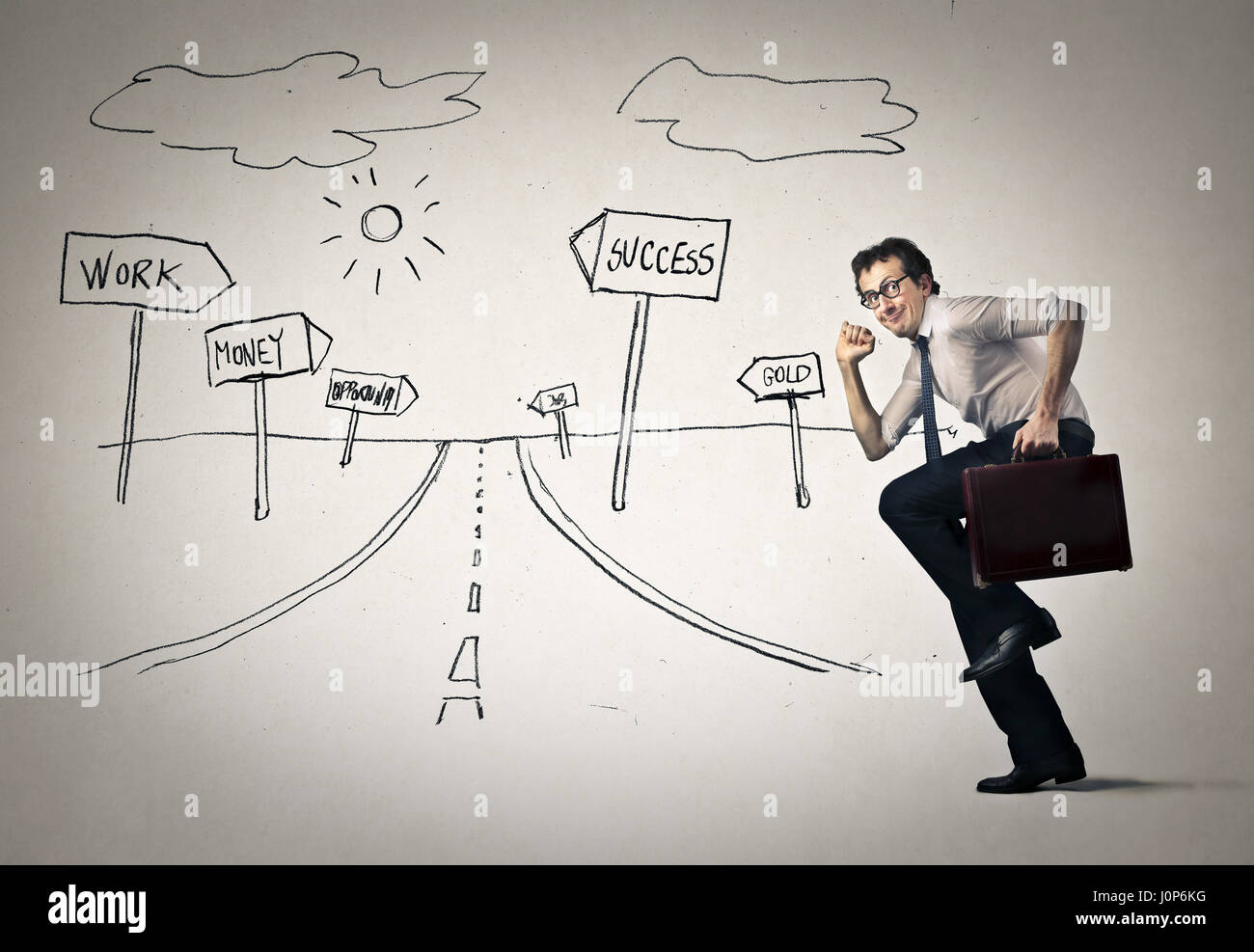 Businessman running towards success Stock Photo - Alamy