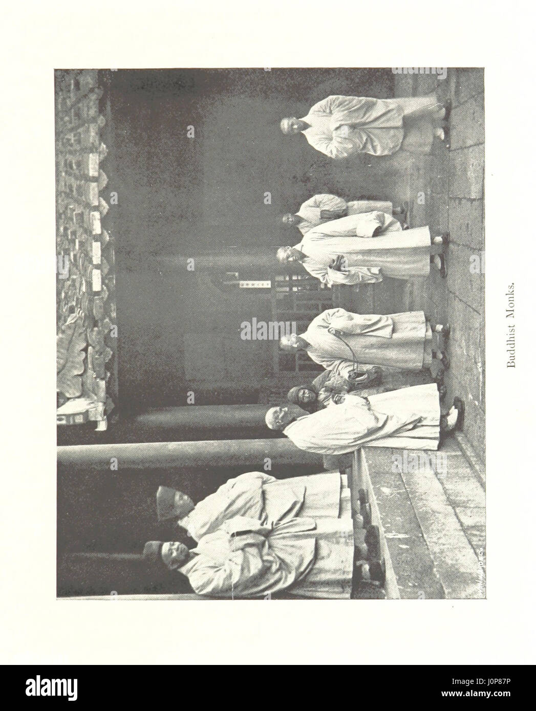 This book, 'Through China with a Camera,' offers a visual exploration ...