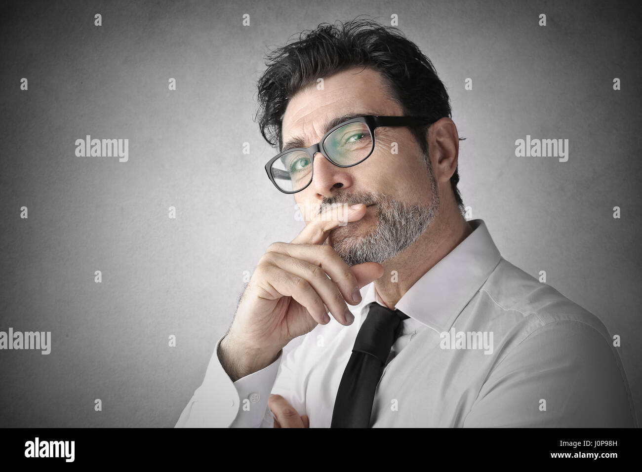 Businessman thinking inside Stock Photo - Alamy