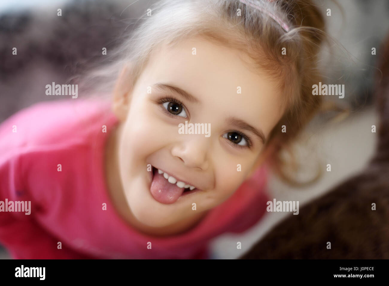 happy autistic girl smiling and play Stock Photo - Alamy