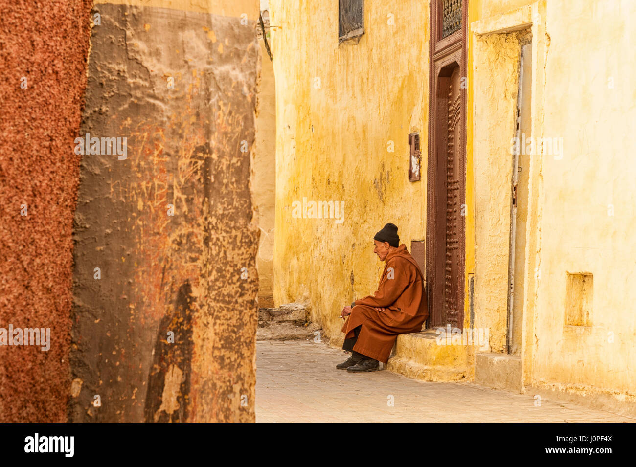 MEKNES, MOROCCO - FEBRUARY 18, 2017: Unidentified man sitting in the ...