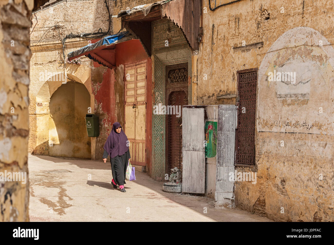 MEKNES, MOROCCO - FEBRUARY 18, 2017: Unidentified woman walking in the ...