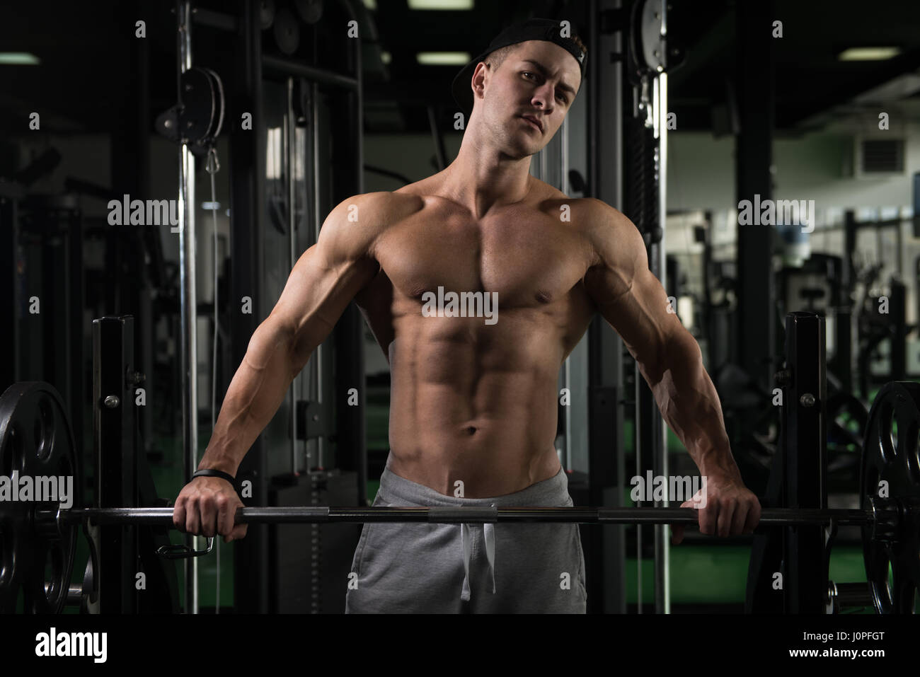 Resting Time - Confident Muscled Young Man Resting In Healthy Club Gym ...