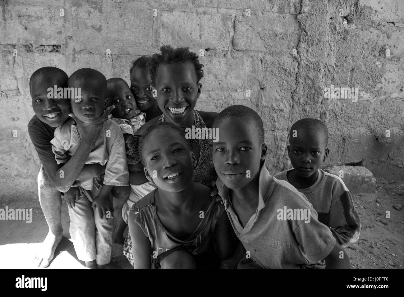 Children posing photo in Black and White Stock Photos & Images - Alamy