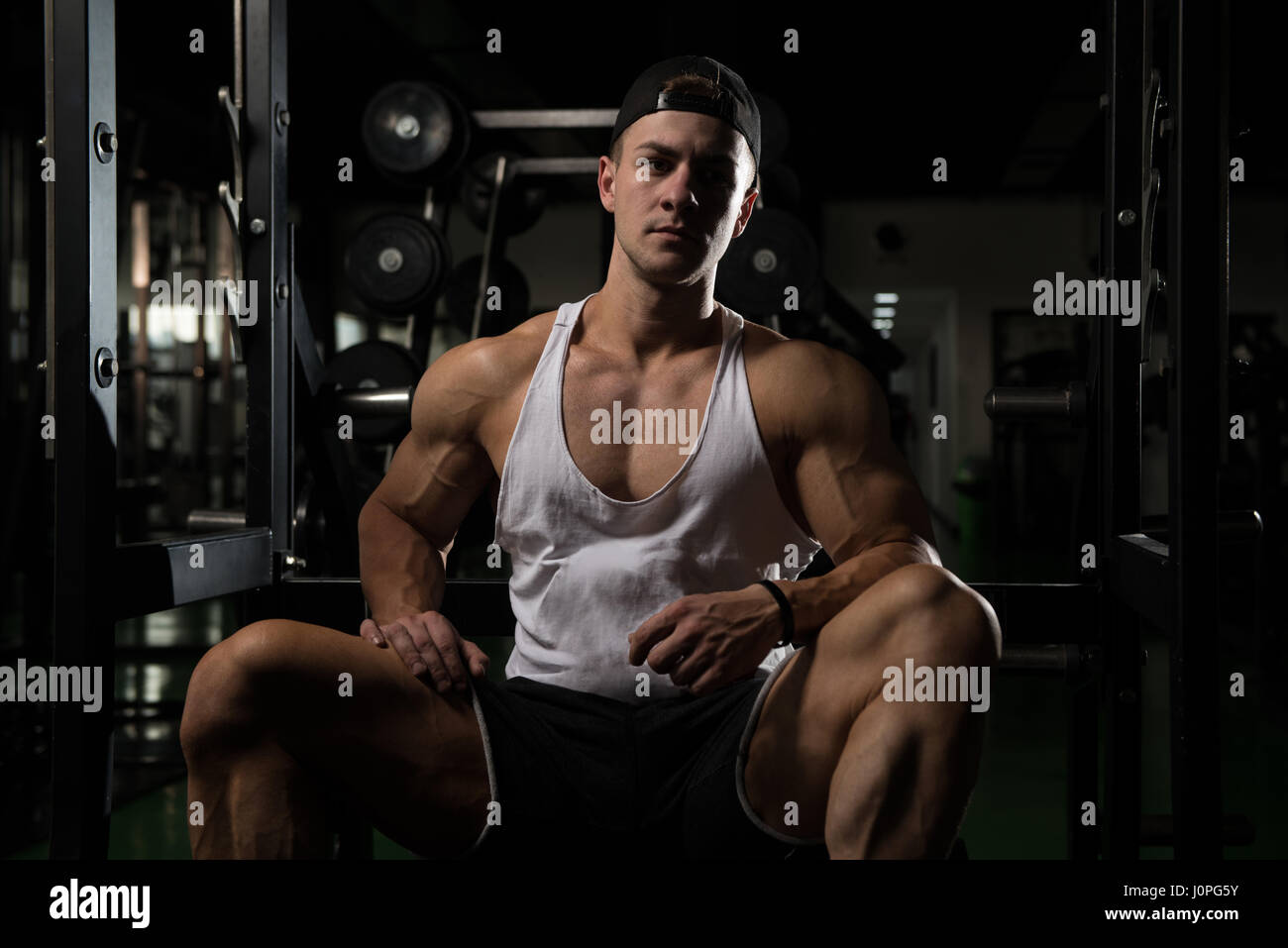 Resting Time - Confident Muscled Young Man Resting In Healthy Club Gym ...
